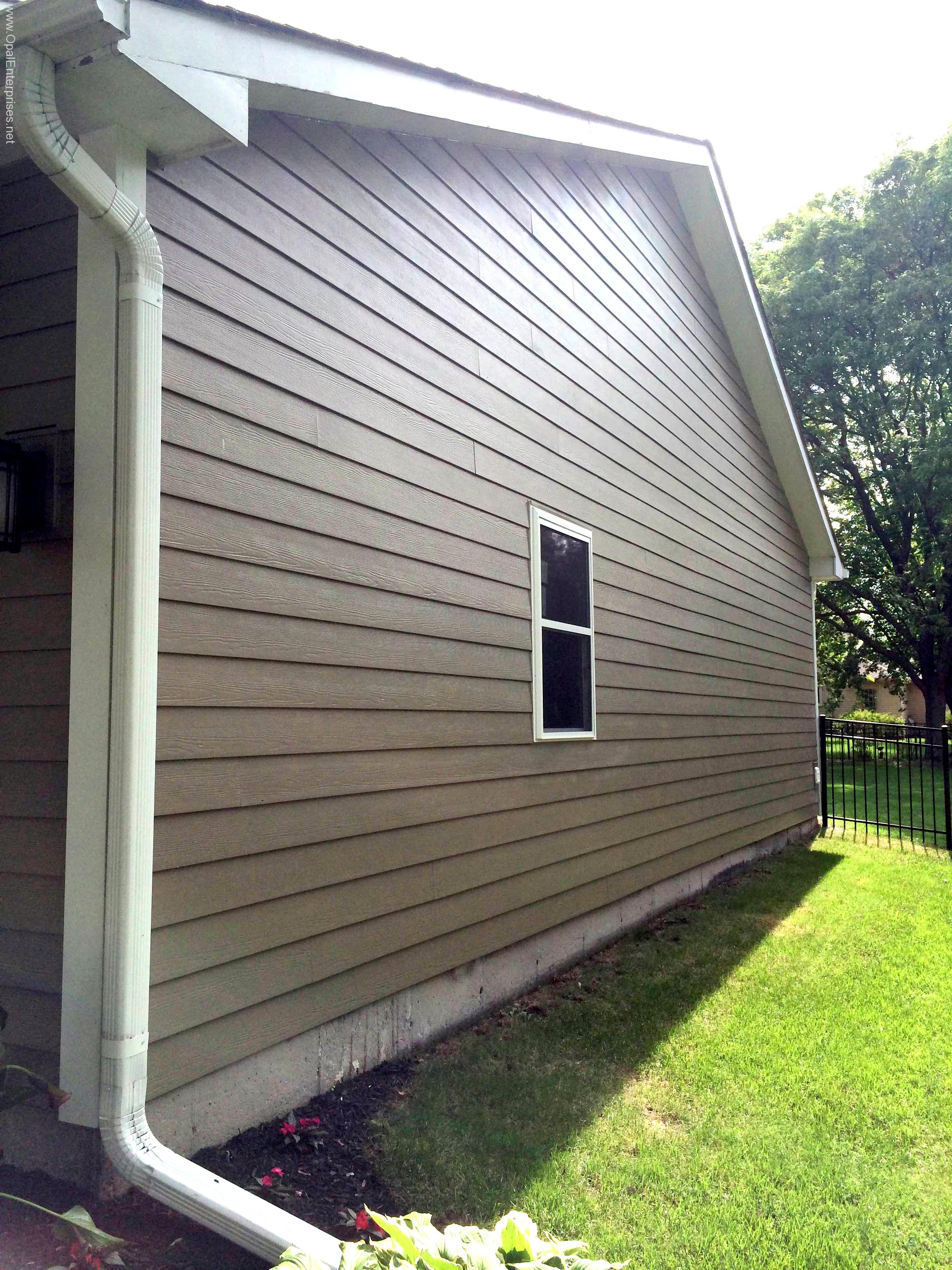 Exterior remodel with James Hardie Siding, Mezzo Windows, & wood porch ...